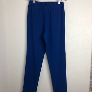 Disney | Pants & Jumpsuits | Disney Alice In Wonderland Blue Skinny ...